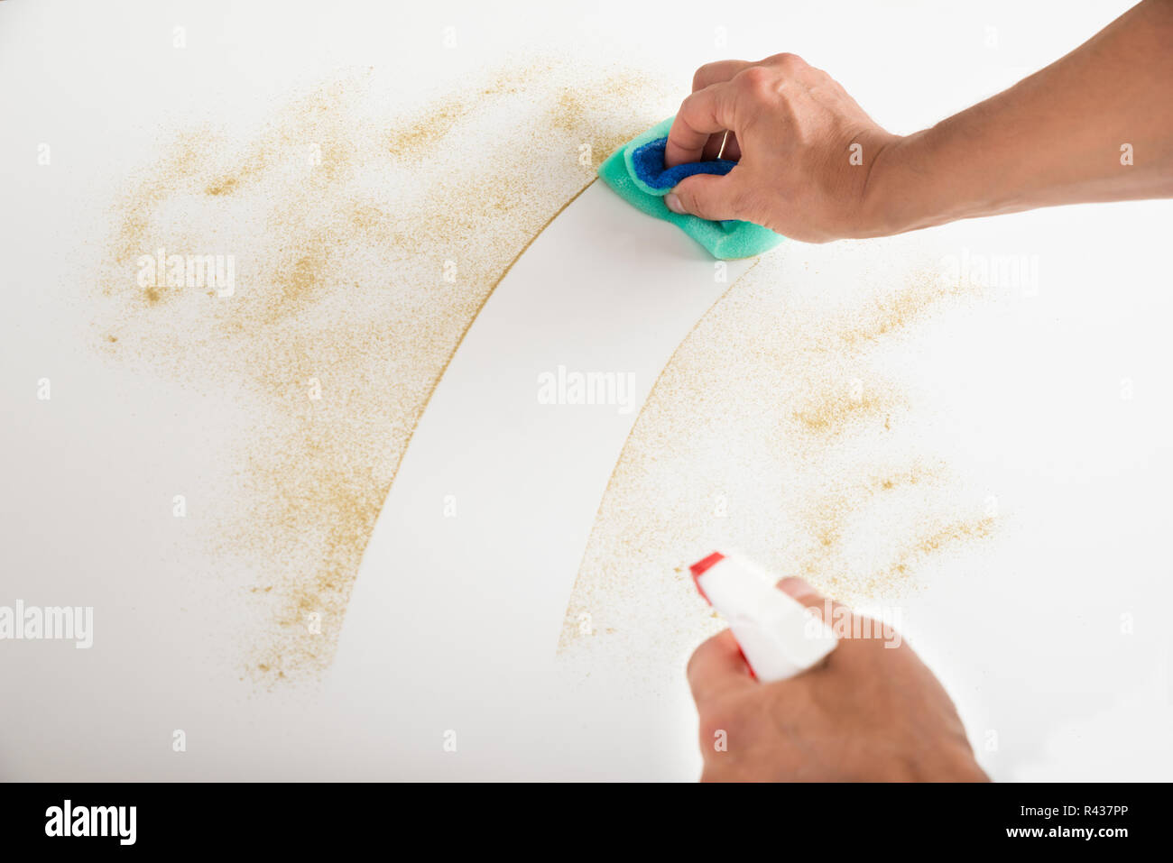 Male Janitor Cleaning Counter Stock Photo - Alamy