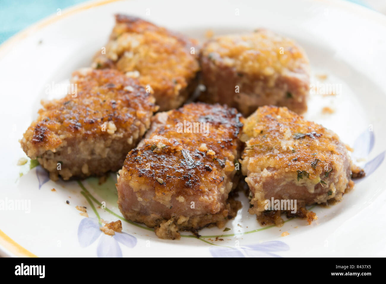 steaks of breaded tuna Stock Photo - Alamy
