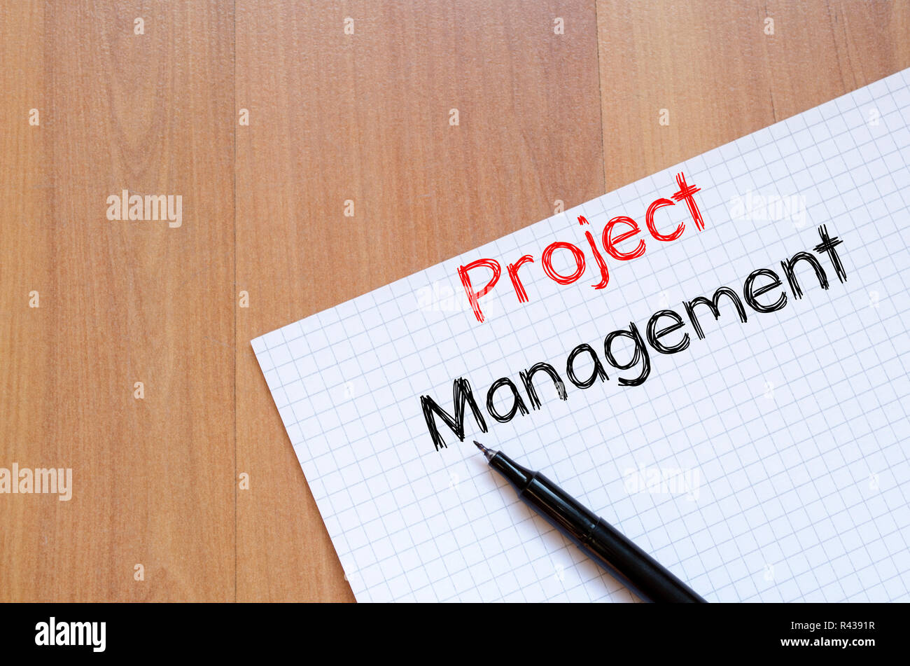 Project management write on notebook Stock Photo - Alamy