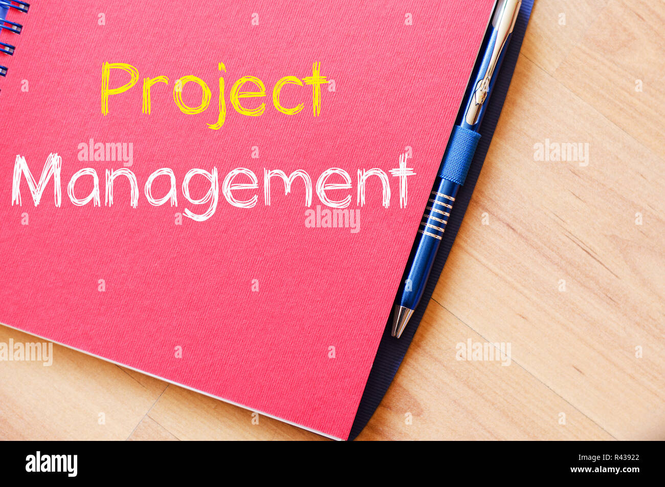Project management write on notebook Stock Photo - Alamy