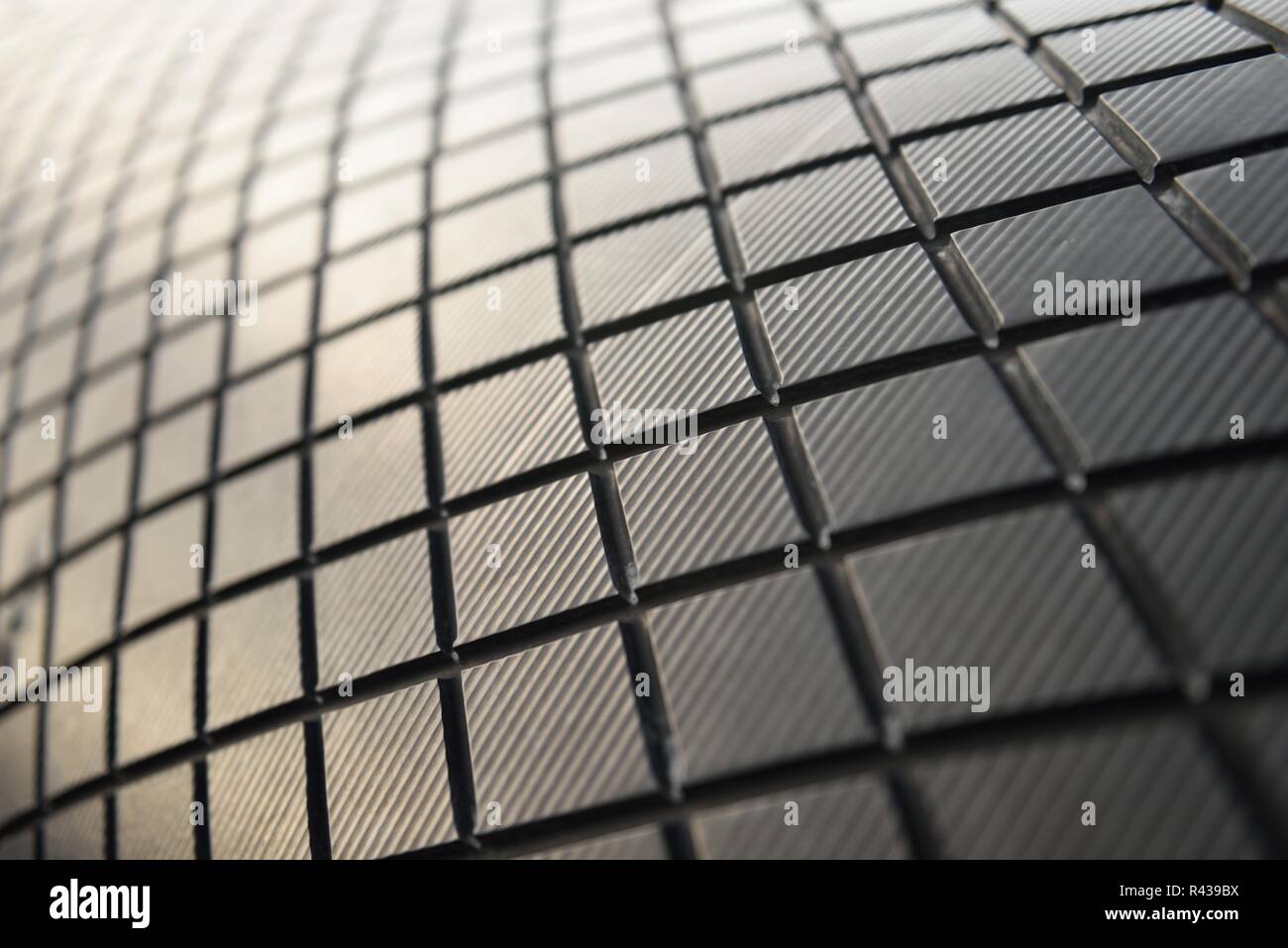 Abstract of lines, patterns, squares, curves, bending grid fading to ...