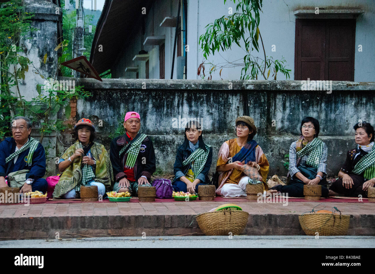 People Giving Alms in Luang Prabang, Laos Stock Photo - Alamy