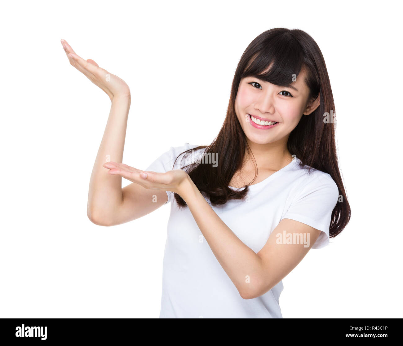 Asian woman with open hand palm Stock Photo - Alamy
