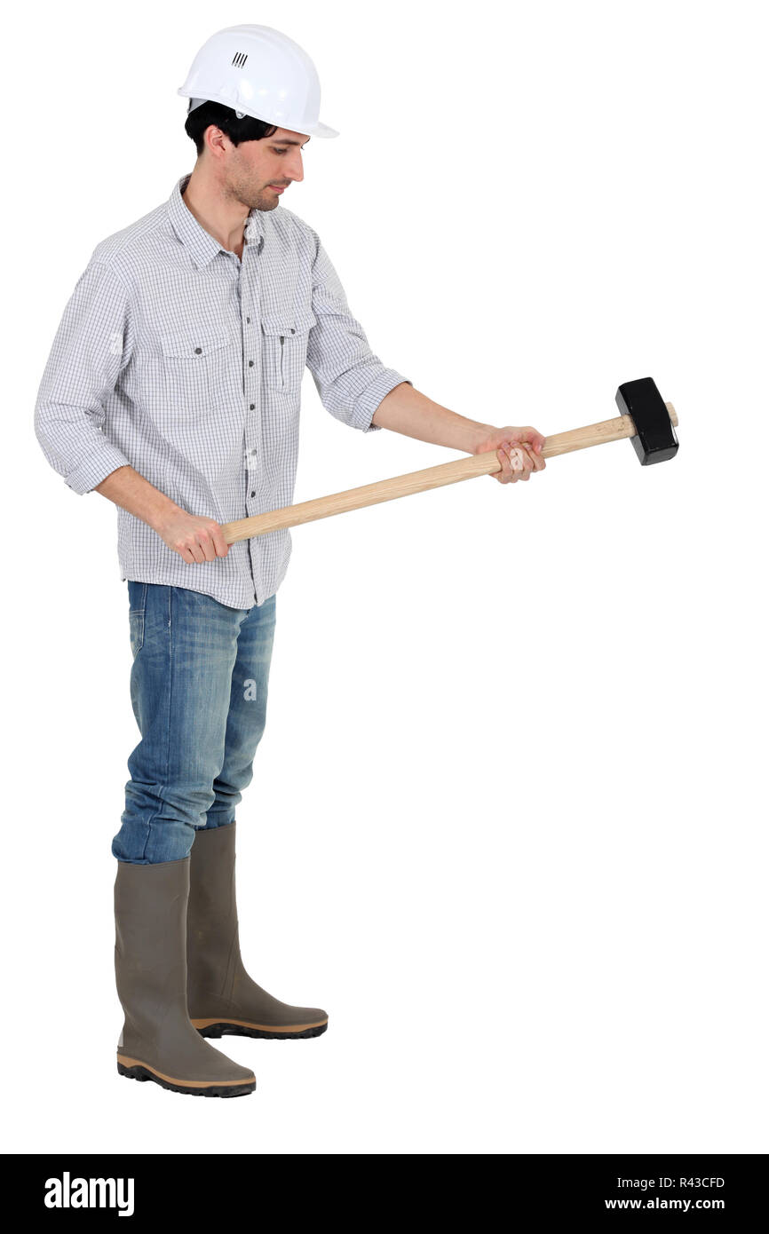 craftsman holding a hammer Stock Photo - Alamy