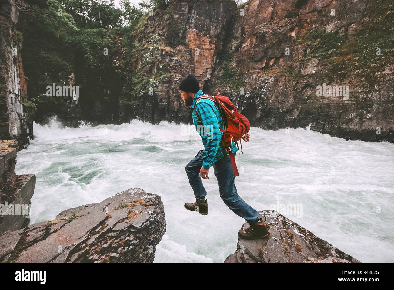 Jumping on rocks hi-res stock photography and images - Alamy