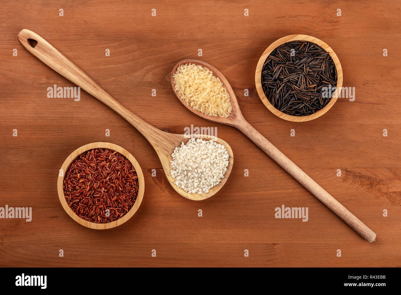 An overhead photo of red long grain Camargue rice, white paella rice ...