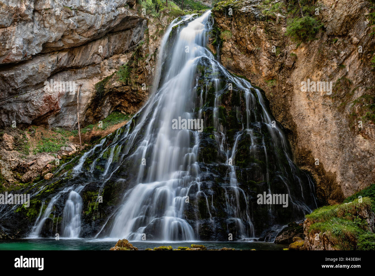 Beautiful view of famous Gollinger Wasserfall with mossy rocks and ...