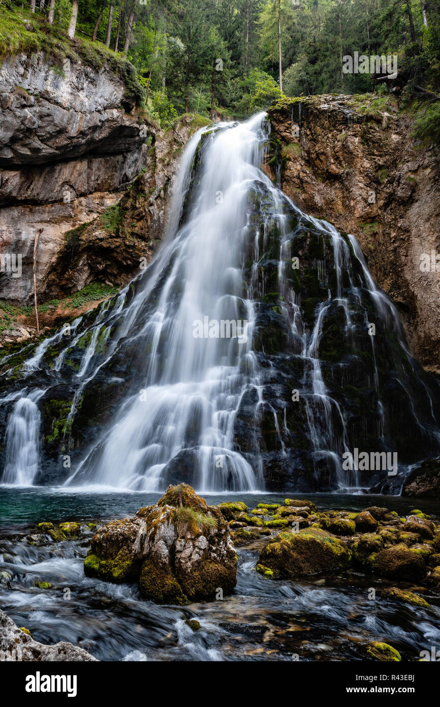 Beautiful view of famous Gollinger Wasserfall with mossy rocks and ...