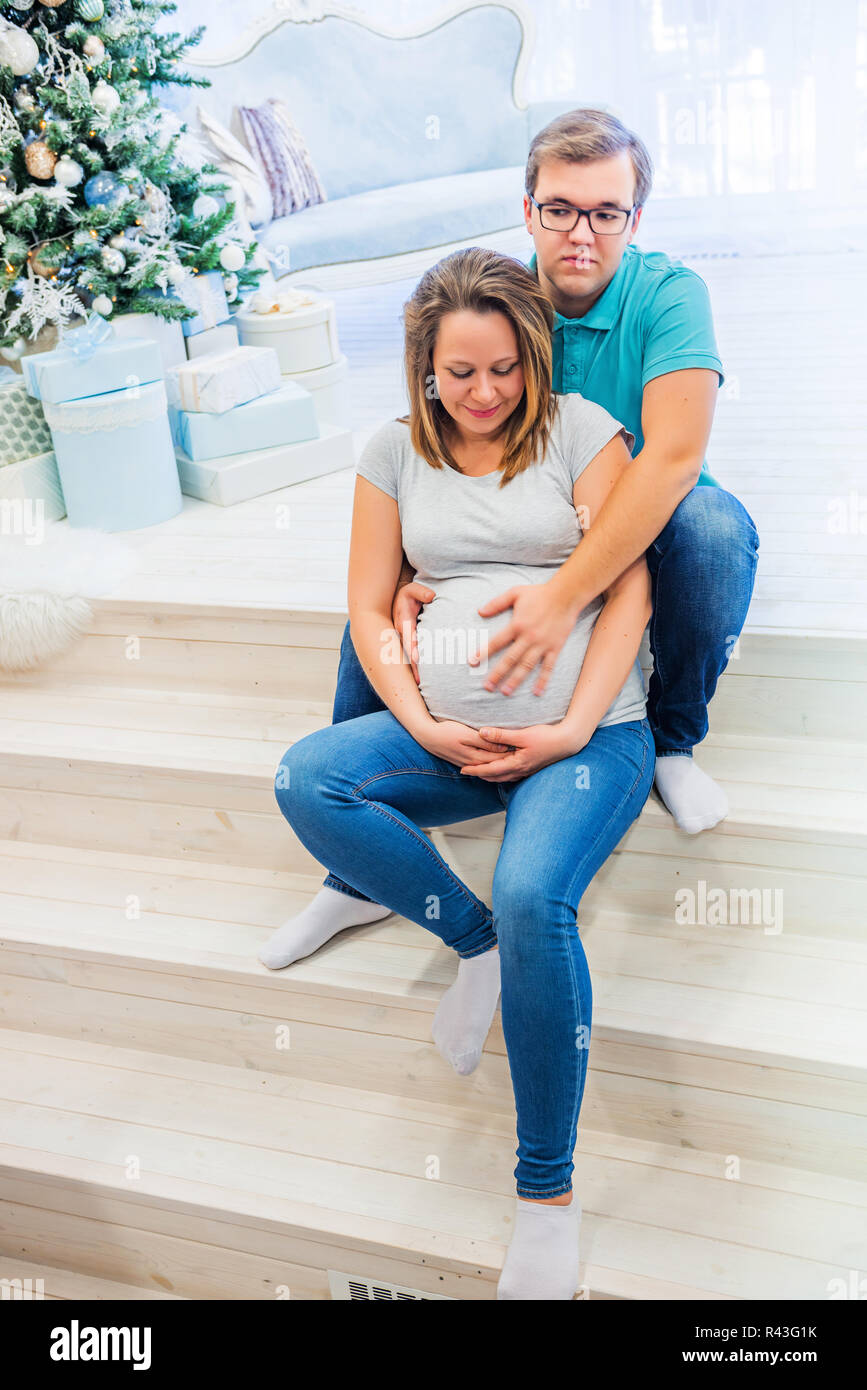 Family portrait near christmas tree Stock Photo - Alamy