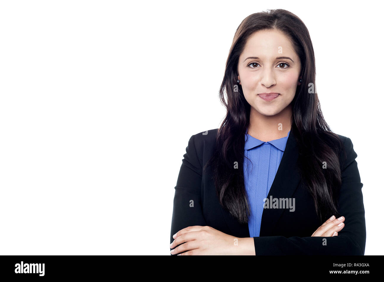 Female boss posing with arms crossed Stock Photo - Alamy