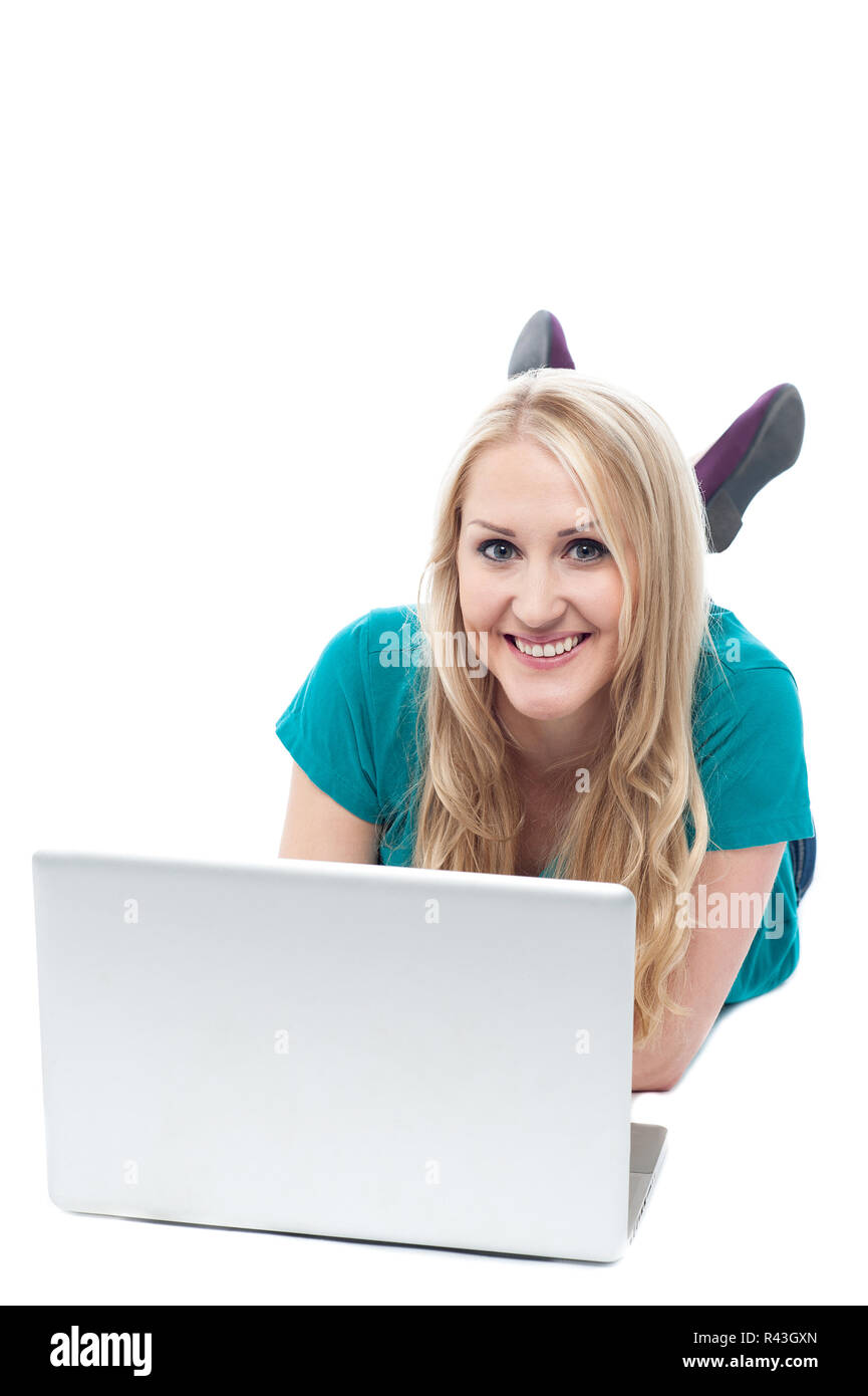 Cheerful young lady using Cut Out Stock Images & Pictures - Alamy