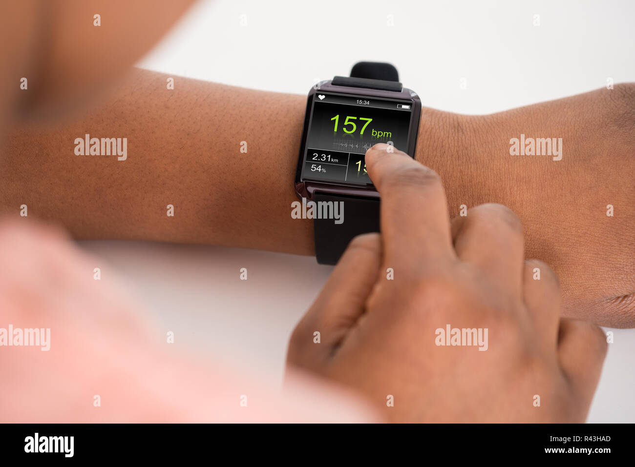 Human Hand Wearing Smartwatch Showing Heartbeat Rate Stock Photo - Alamy