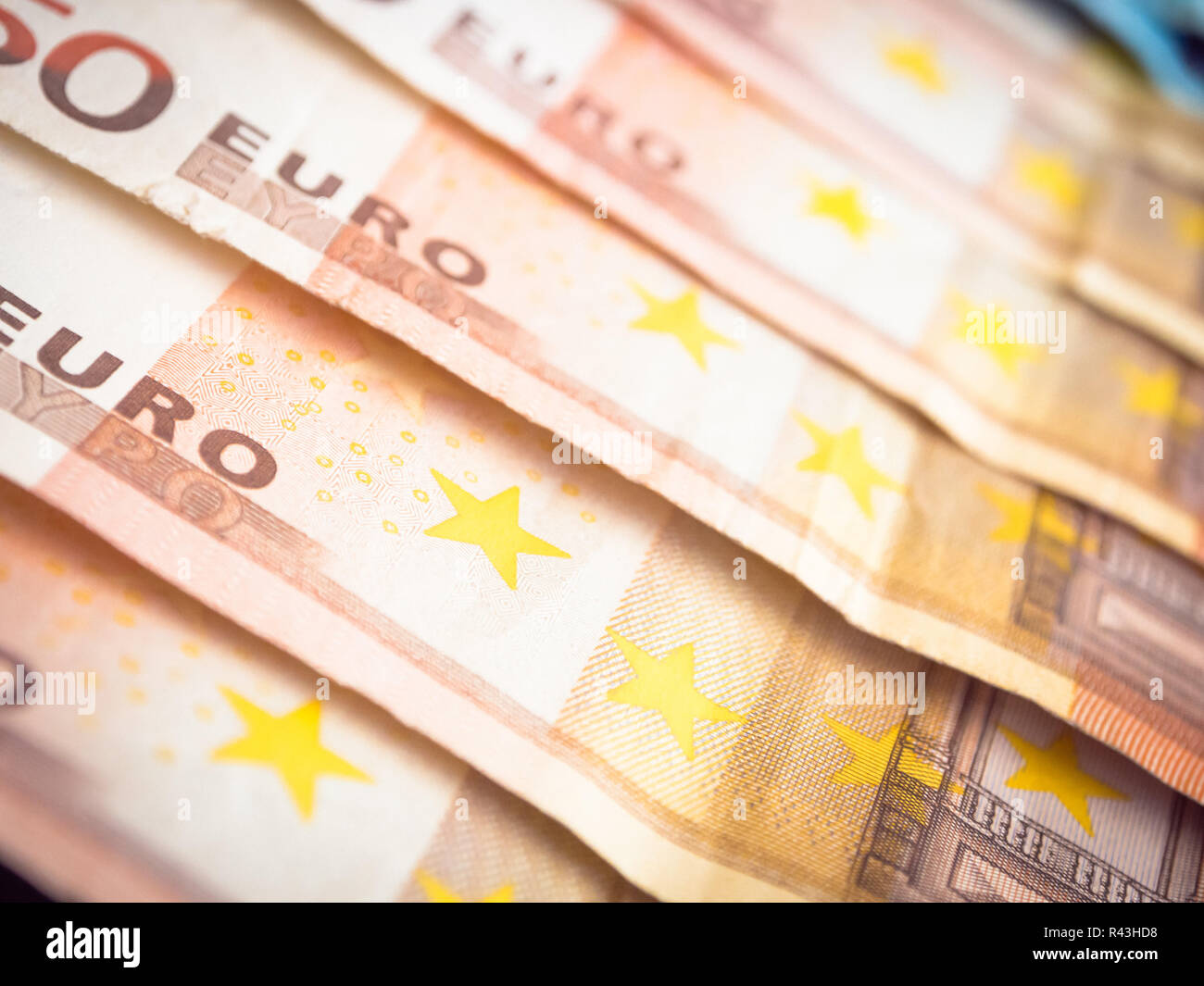 Euros with dark background Stock Photo - Alamy