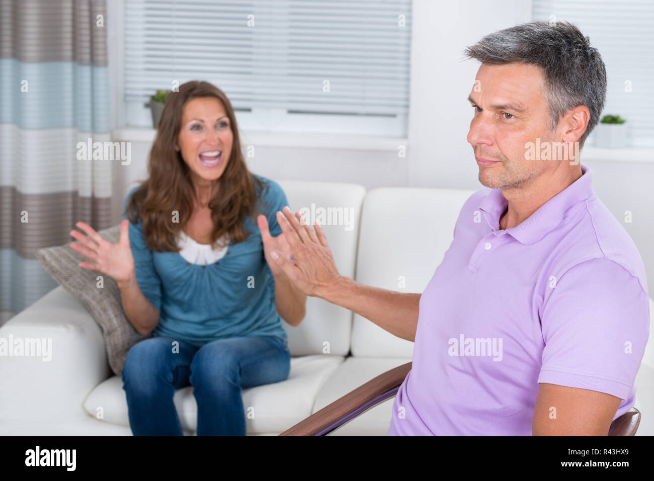 Mature Woman Arguing With Man Stock Photo - Alamy