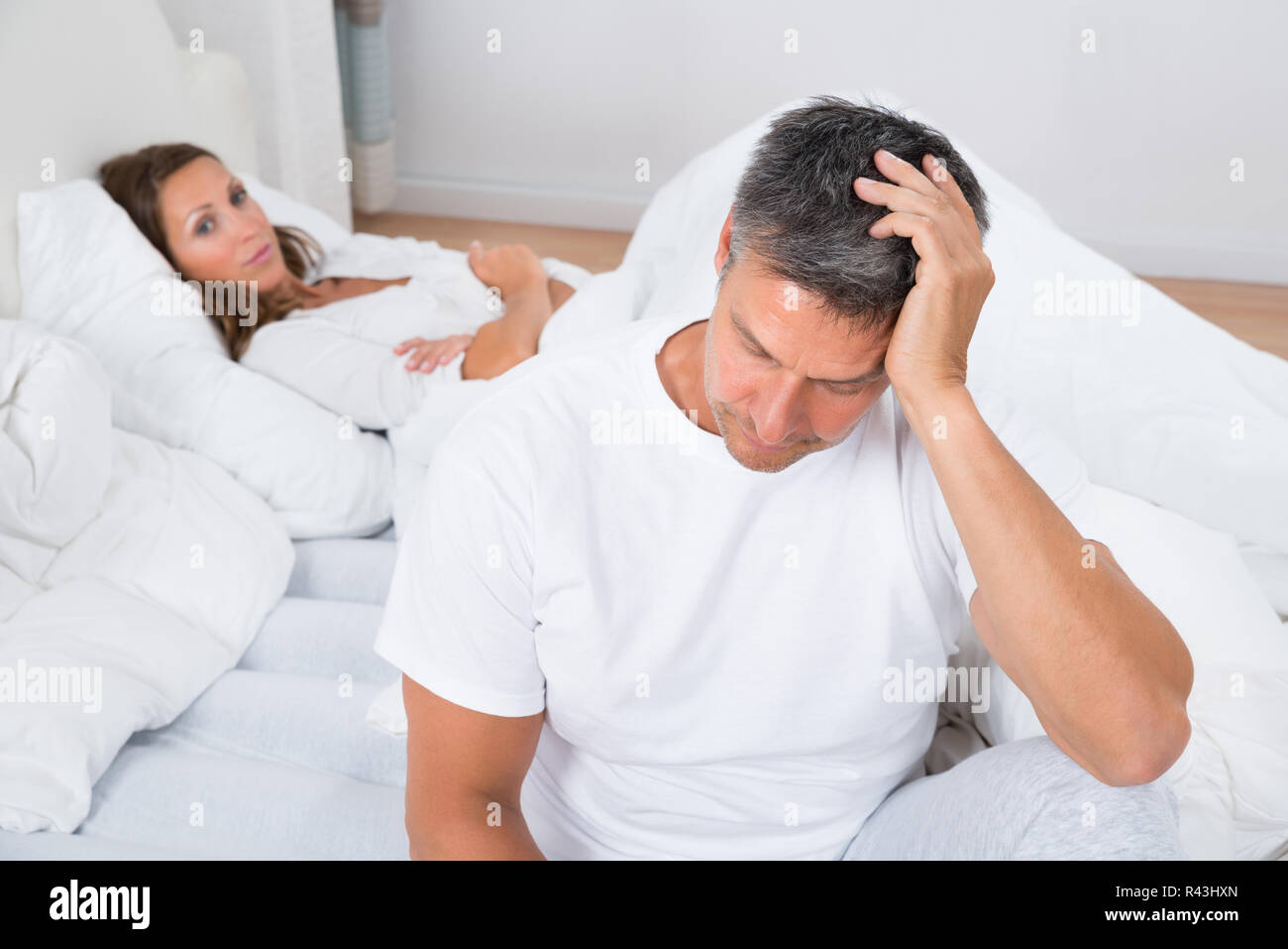 Sad white caucasian couple look hi-res stock photography and images - Alamy