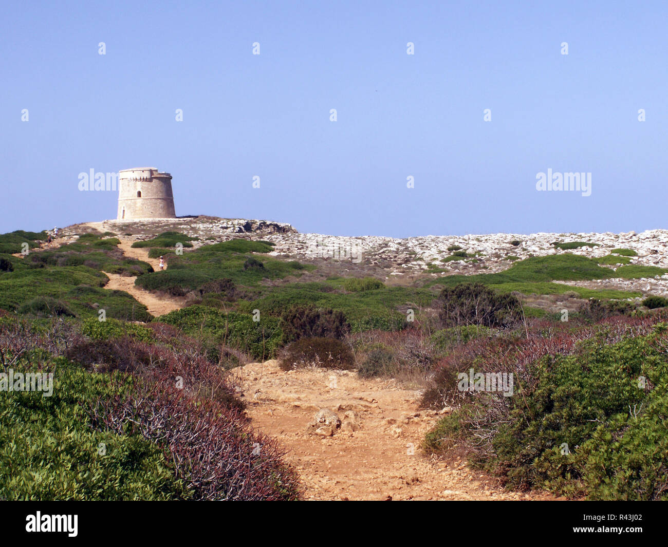 defensive tower in menorca Stock Photo - Alamy