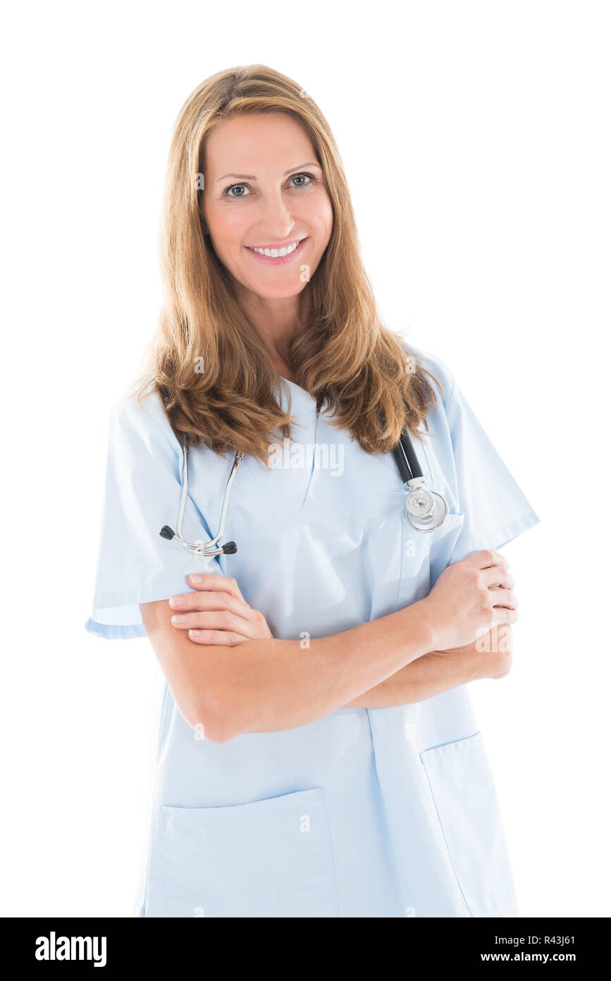Happy Female Doctor Standing Arms Crossed Stock Photo - Alamy
