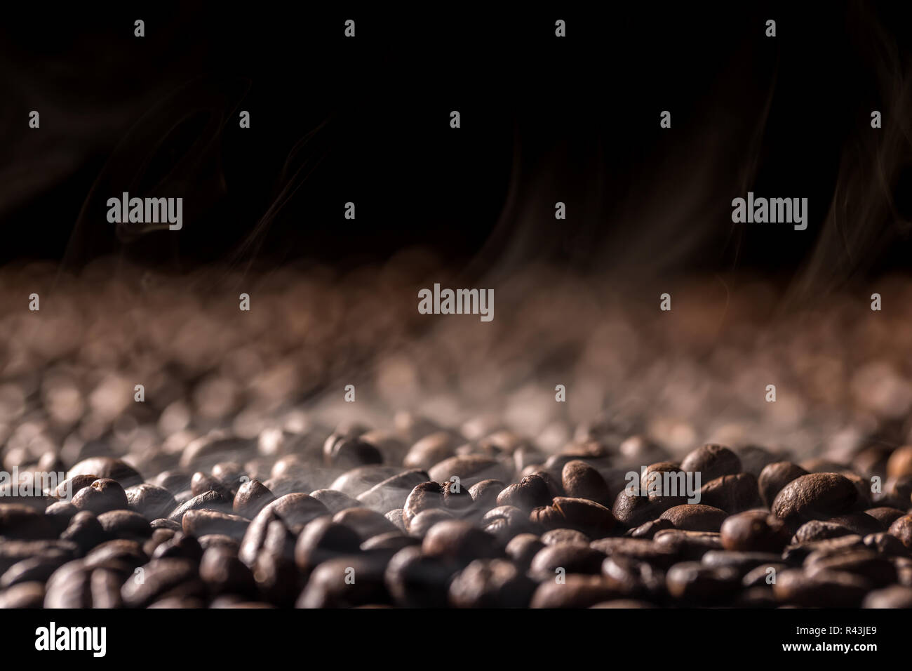 Fried coffee beans Stock Photo - Alamy