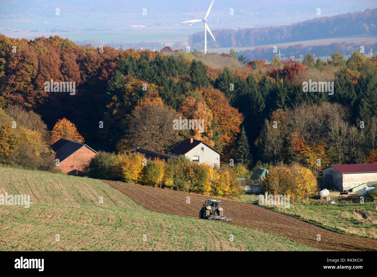 autumn landscape with tractor Stock Photo - Alamy