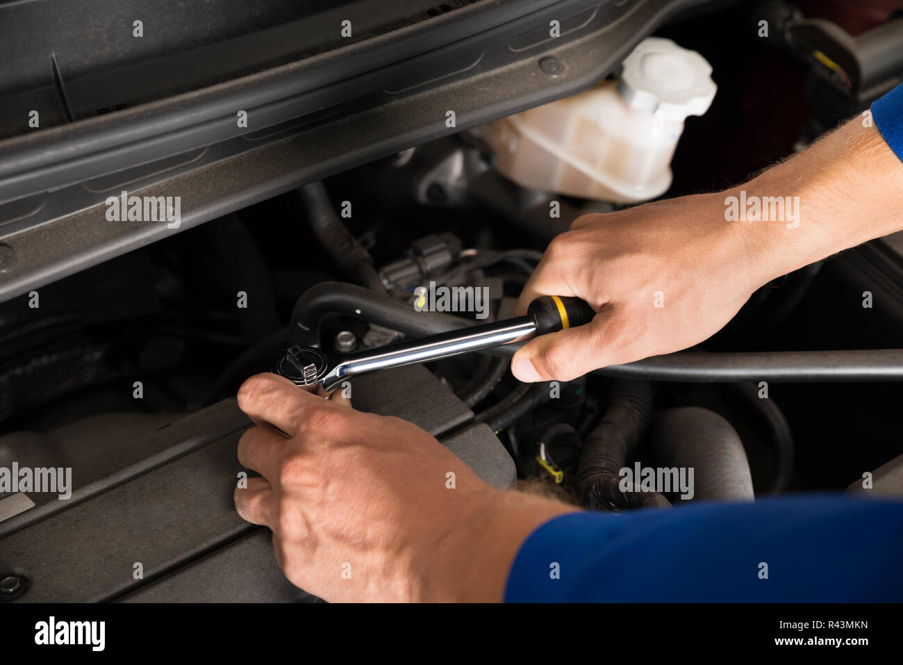 Mechanic Repairing Car Stock Photo - Alamy
