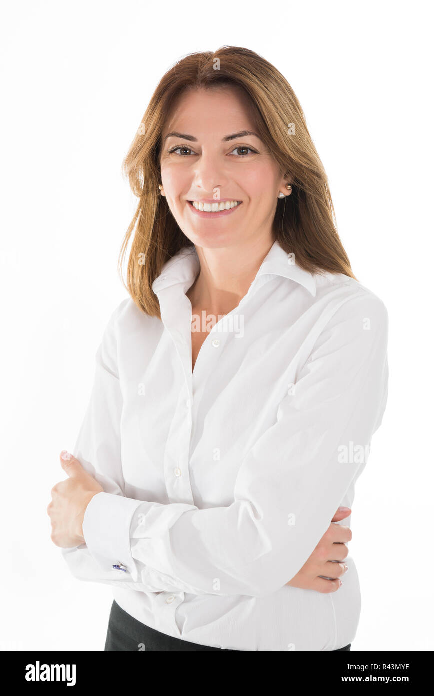 Happy Hostess Standing Arms Crossed Stock Photo - Alamy