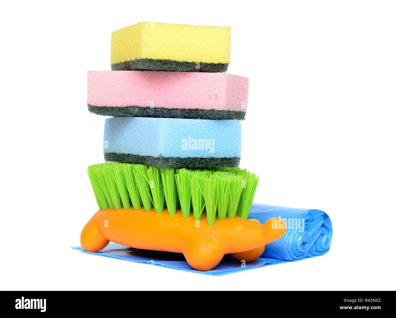 Sponges, garbage bags and brush for cleaning Stock Photo - Alamy