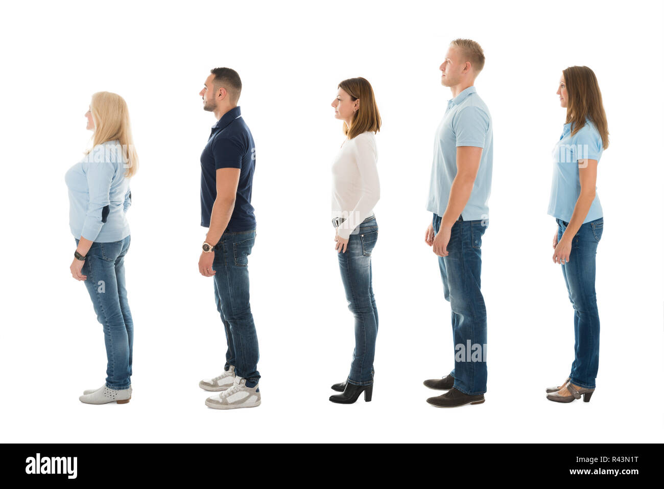 Side View Of People Standing In Queue Stock Photo - Alamy