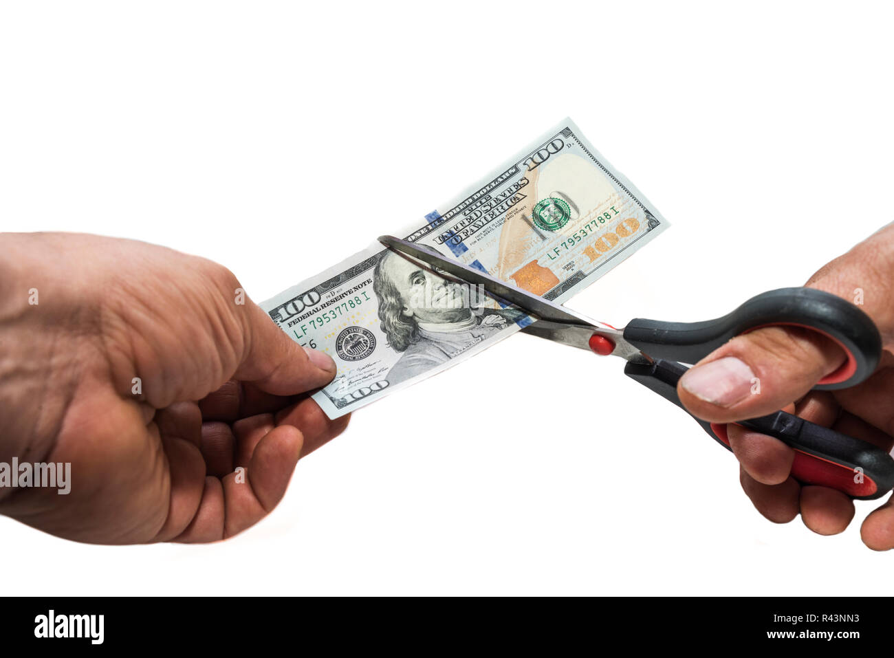 Dollars scissors money cutting hi-res stock photography and images - Alamy