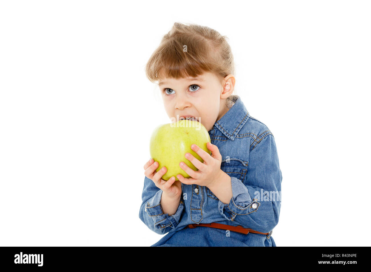 Little child with an apple Stock Photo - Alamy