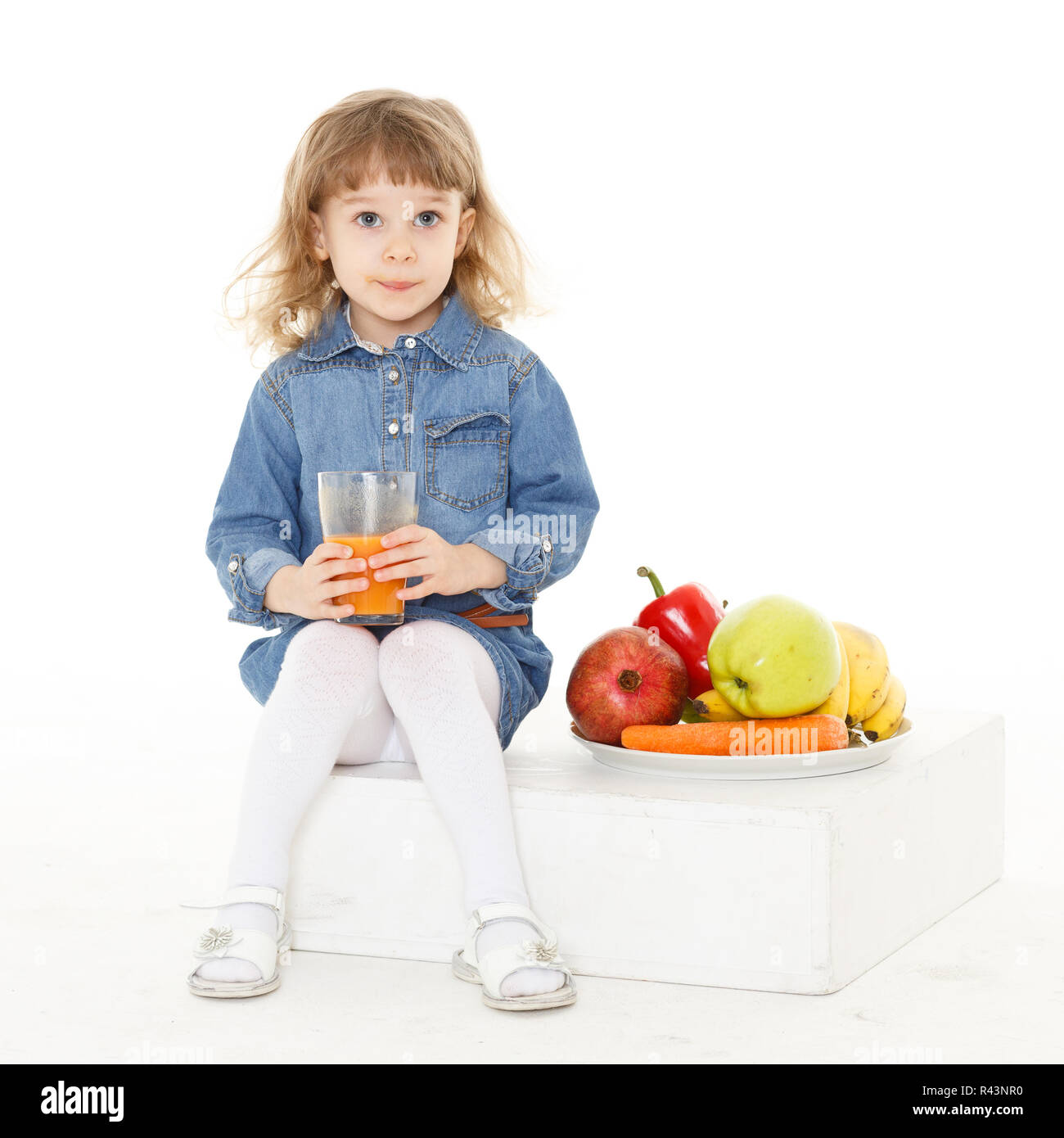 Little child drinks juice Stock Photo - Alamy
