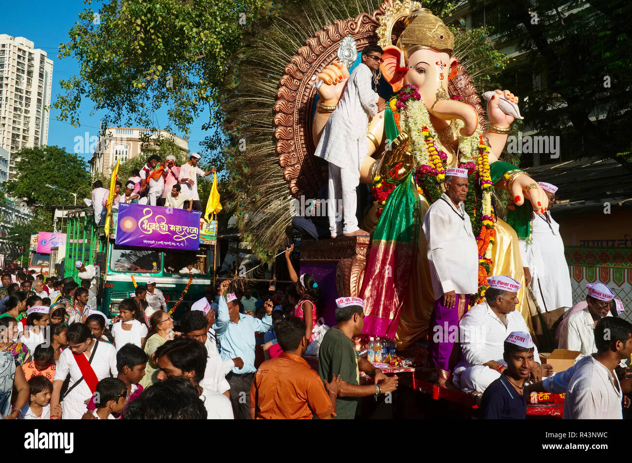 A procession during the Ganesh Festival or Ganesh Chaturthi in Mumbai ...