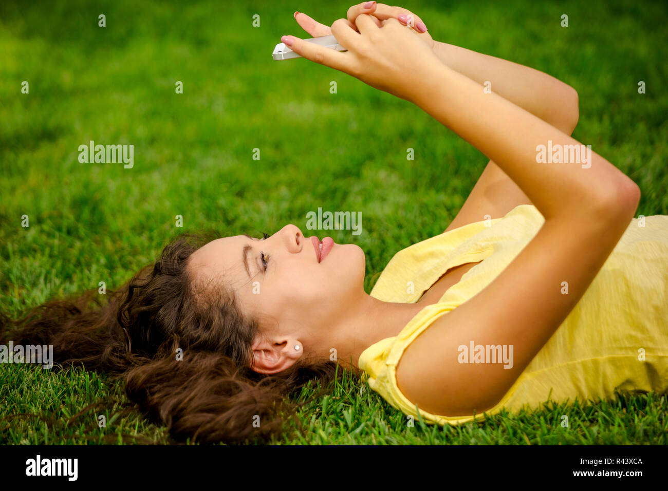Sending a text message Stock Photo - Alamy