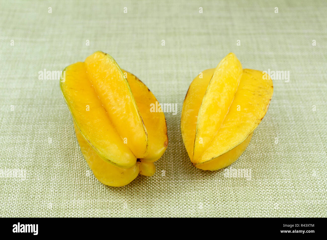 Two Whole Star Fruit Stock Photo - Alamy