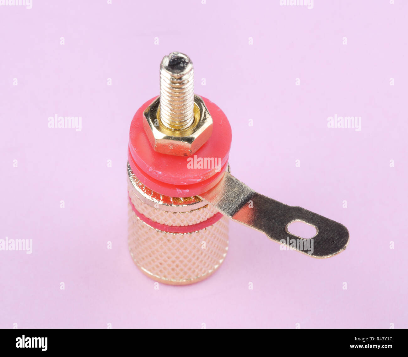 Speaker connector on pink background Stock Photo - Alamy