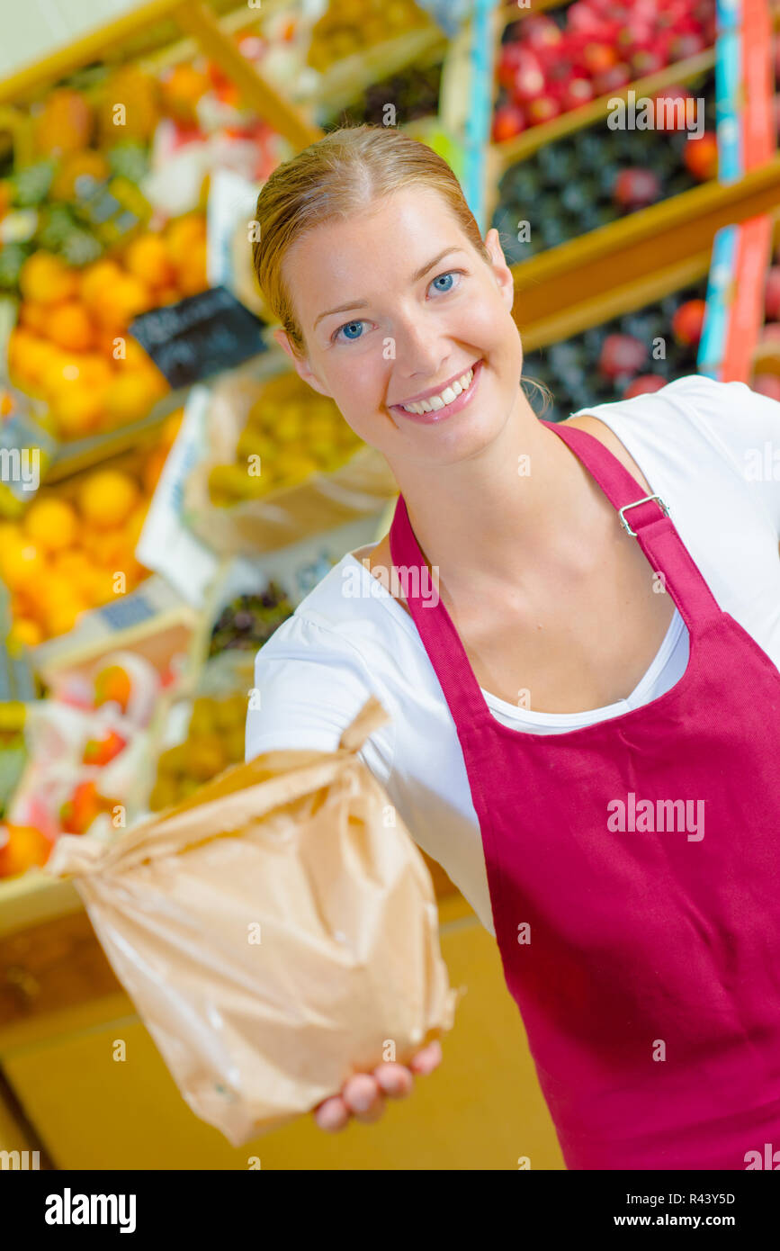 Fruit market worker Stock Photo - Alamy