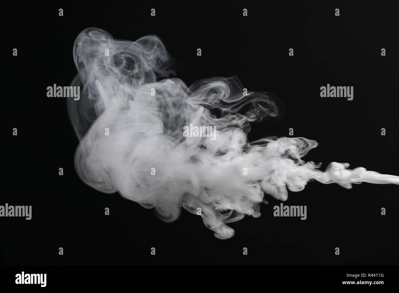 closeup abstract stream of vapor over black background Stock Photo - Alamy