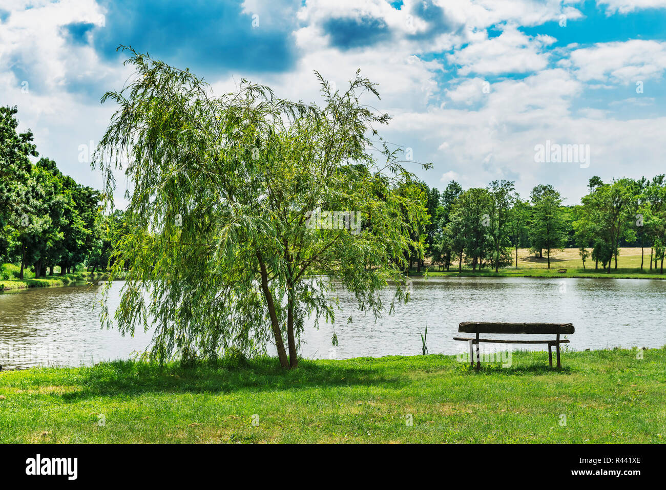 The island is located in the lake in the English landscape garden of ...