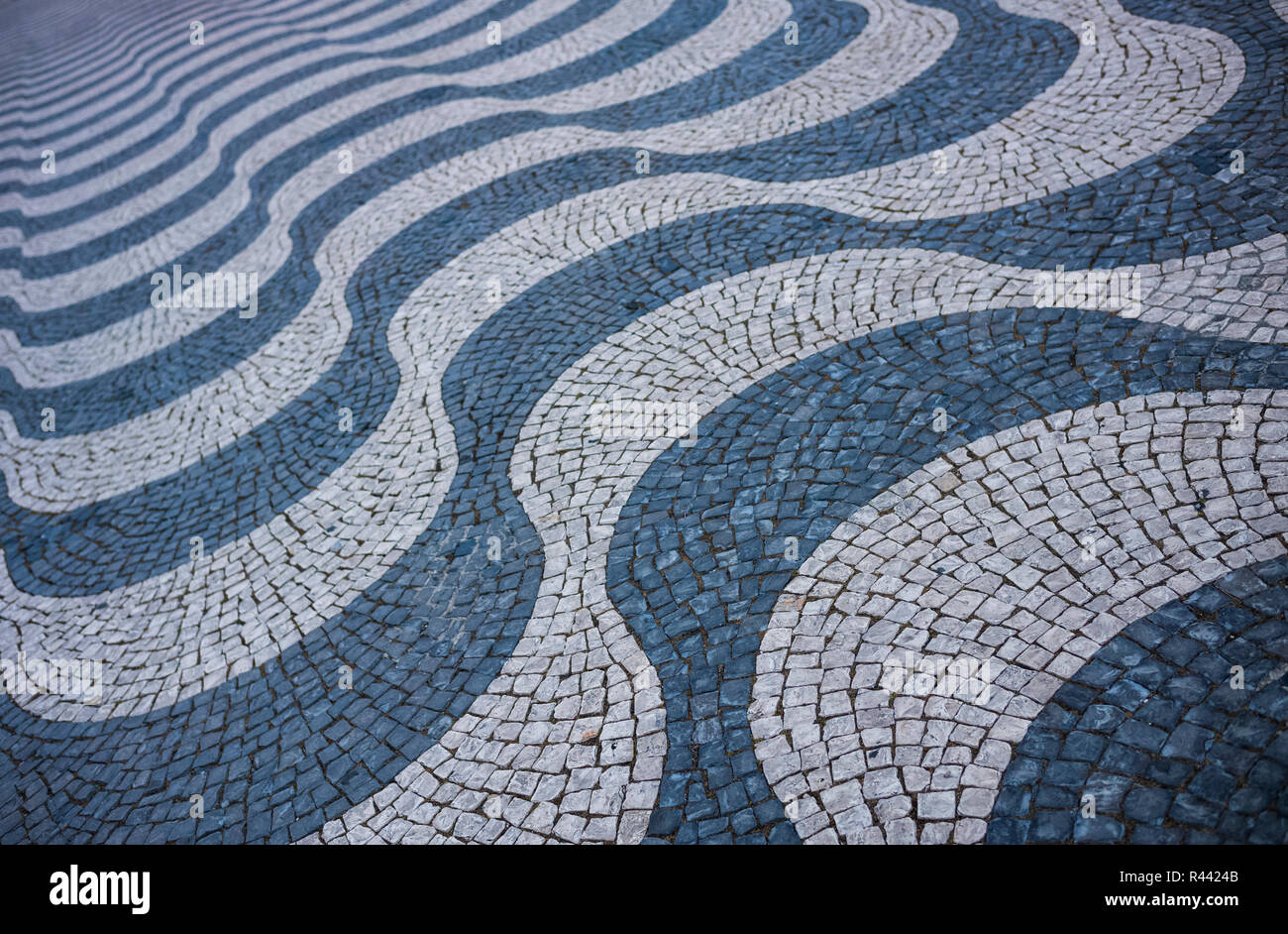 Lisbon, Portugal walkways decorated like ocean waves with stone Stock ...