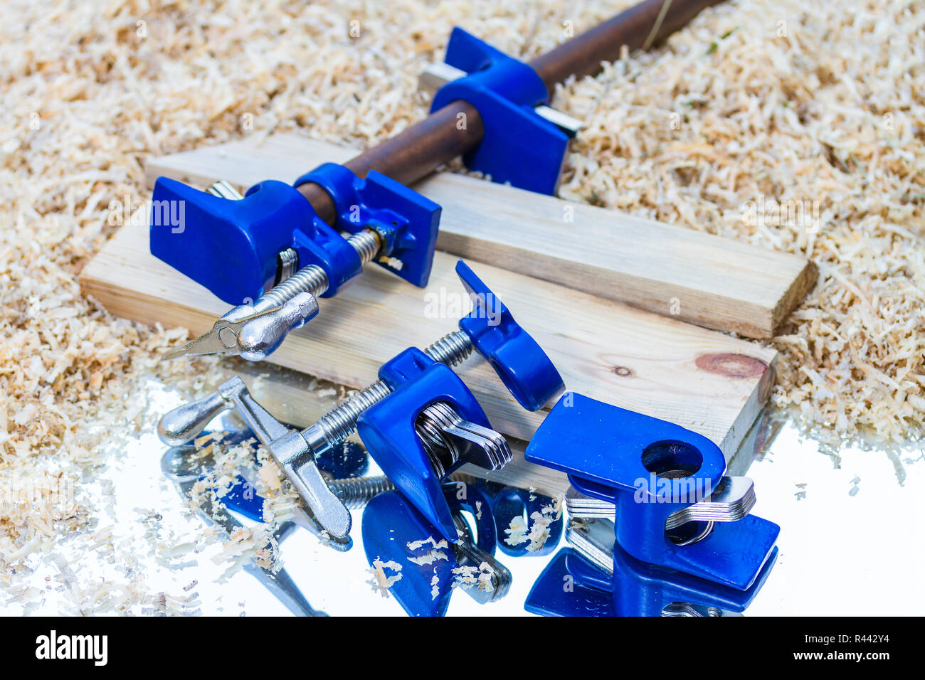 dark blue pipe clamp Stock Photo - Alamy