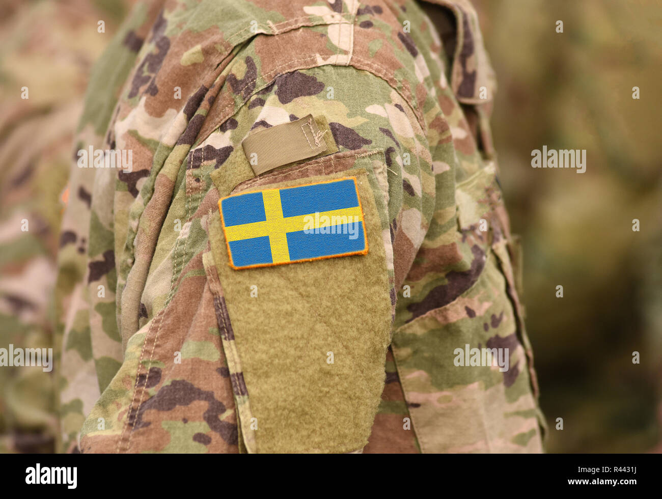 Sweden flag on soldiers arm (collage Stock Photo - Alamy