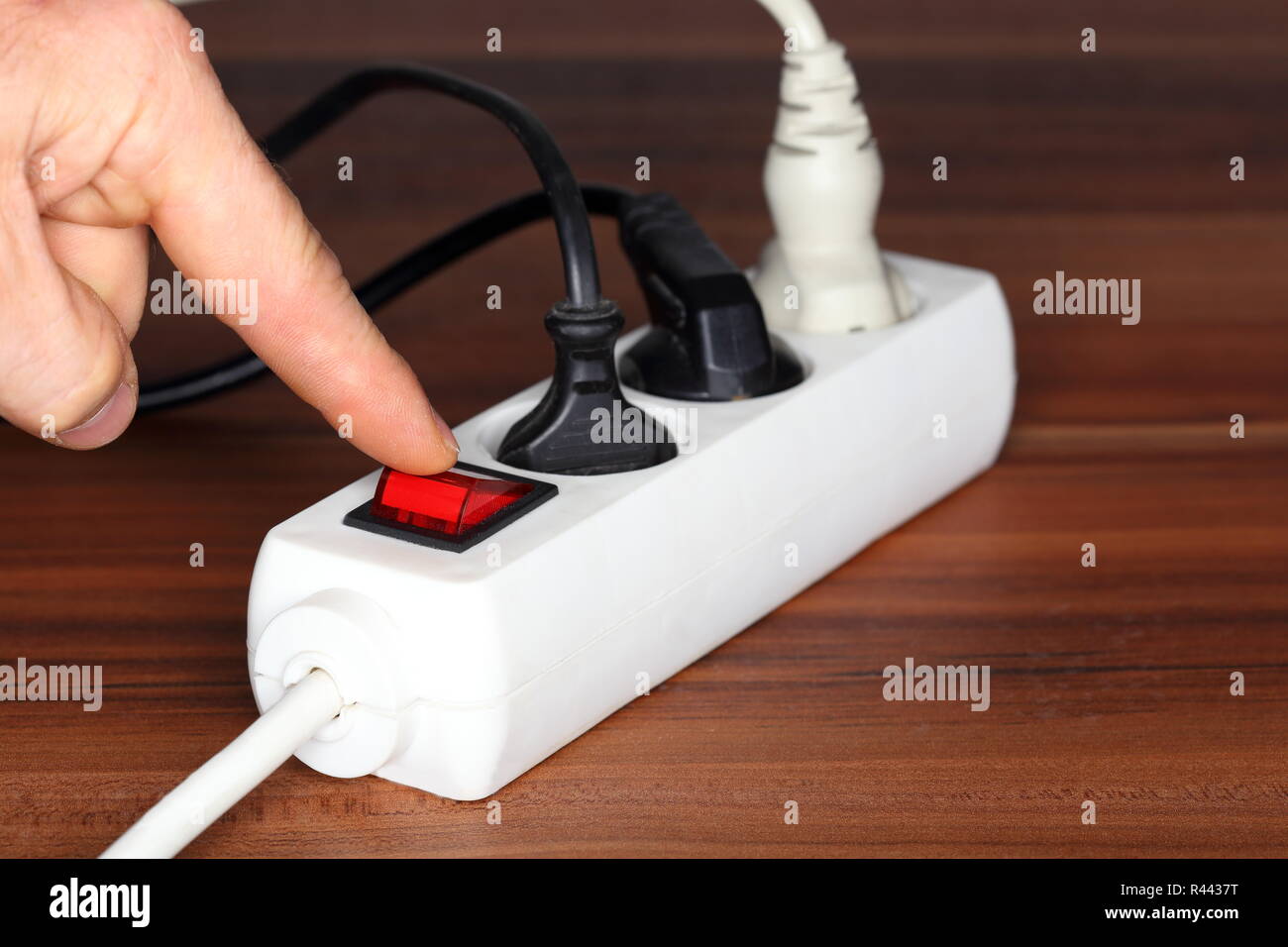 saving switch on the socket Stock Photo - Alamy