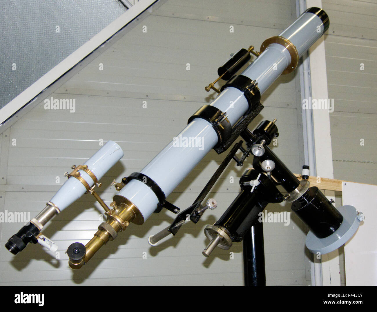 Telescope refractor on equatorial display Stock Photo - Alamy