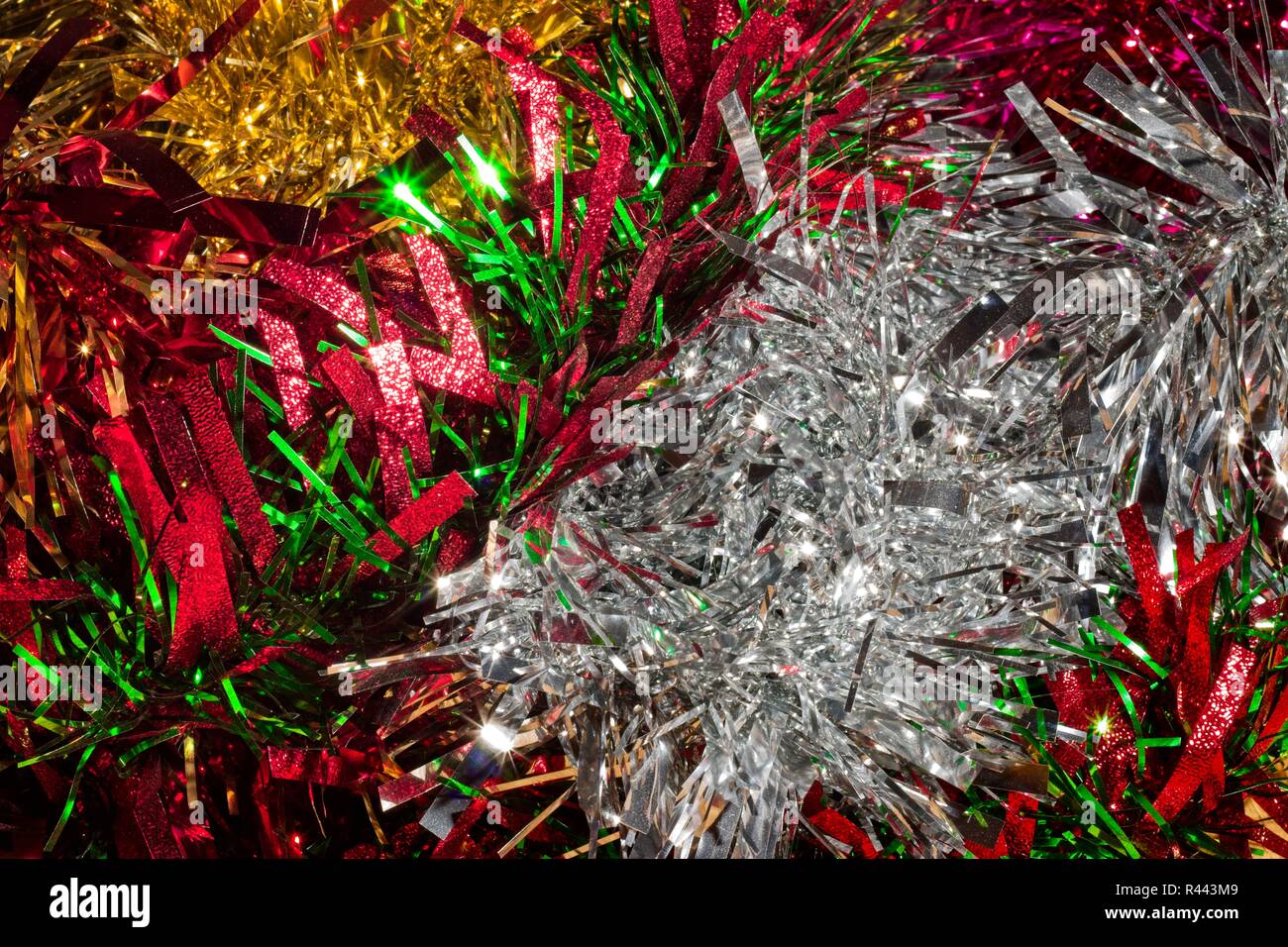 Tinsel decorations for a festive time Christmas Stock Photo - Alamy