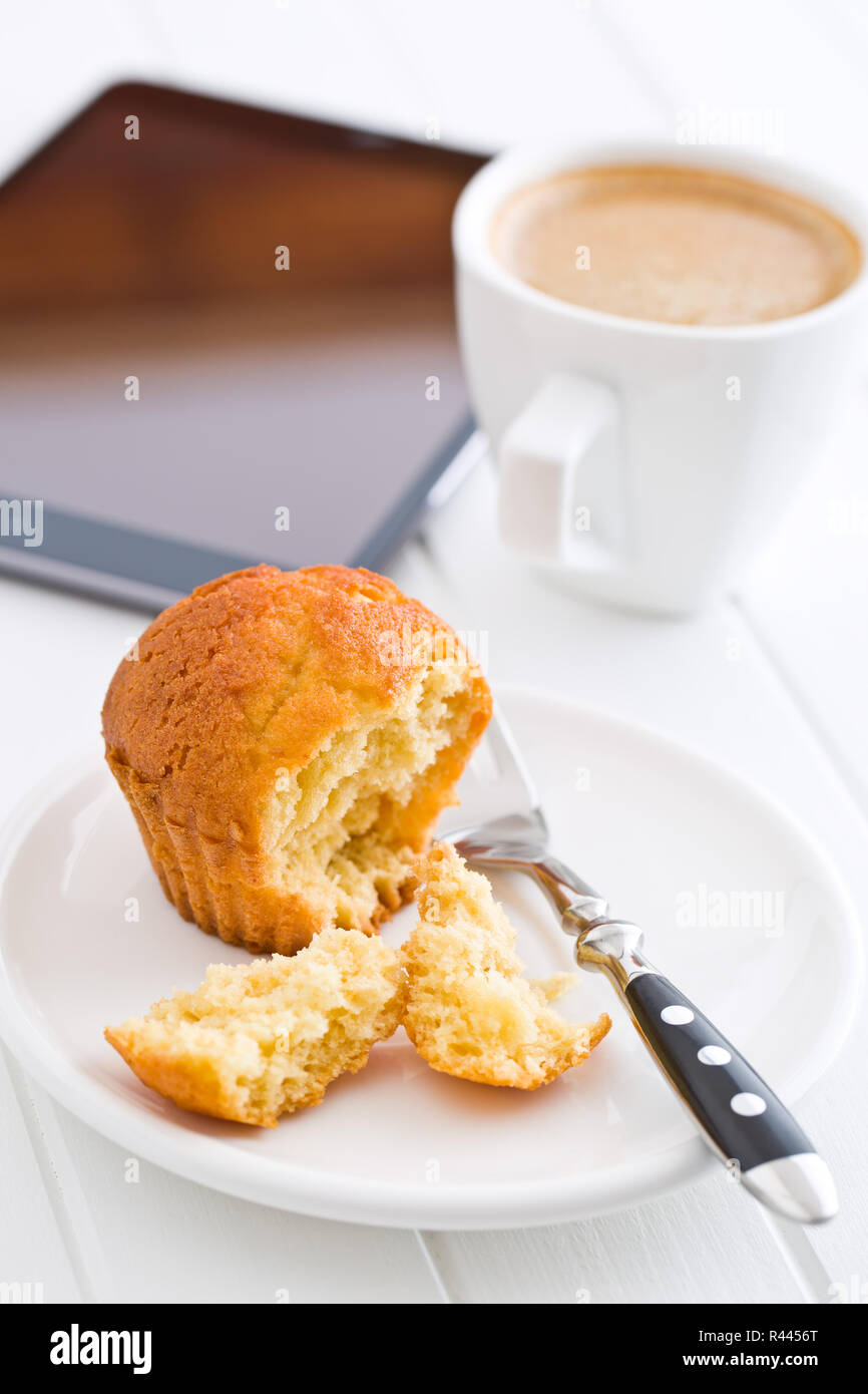 sweet muffin on kitchen table Stock Photo - Alamy