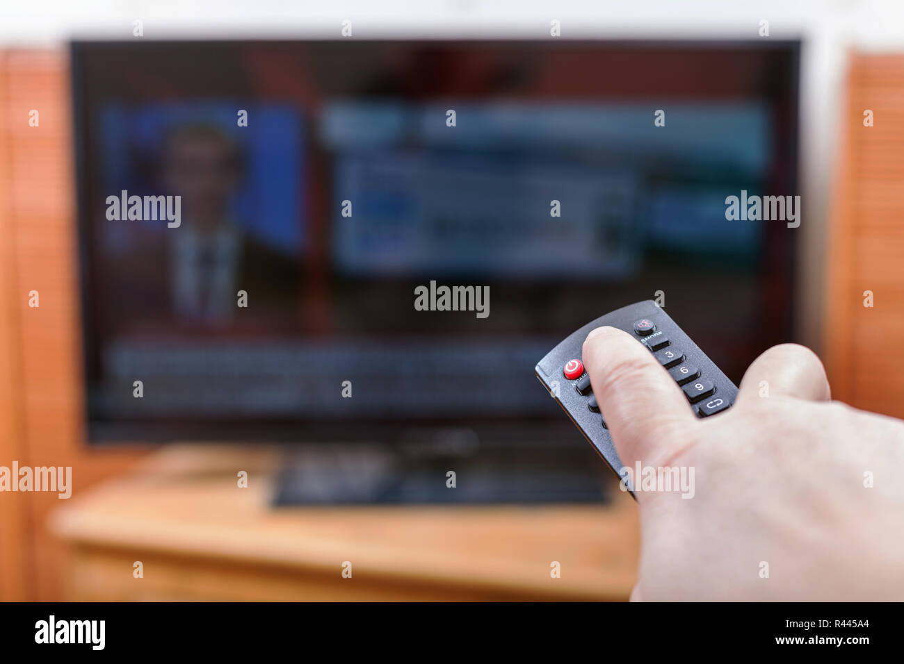 turn off News on TV channel by remote control Stock Photo - Alamy