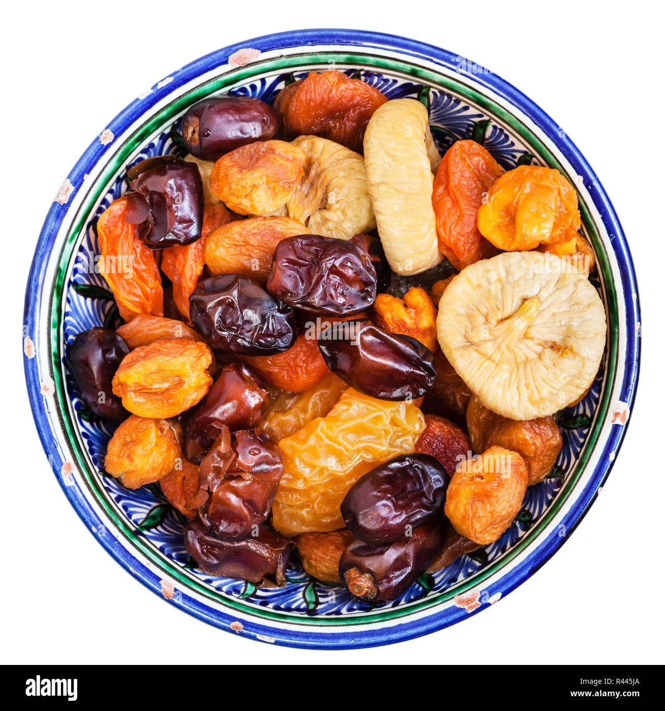 above view of dried fruits in bowl isolated Stock Photo - Alamy