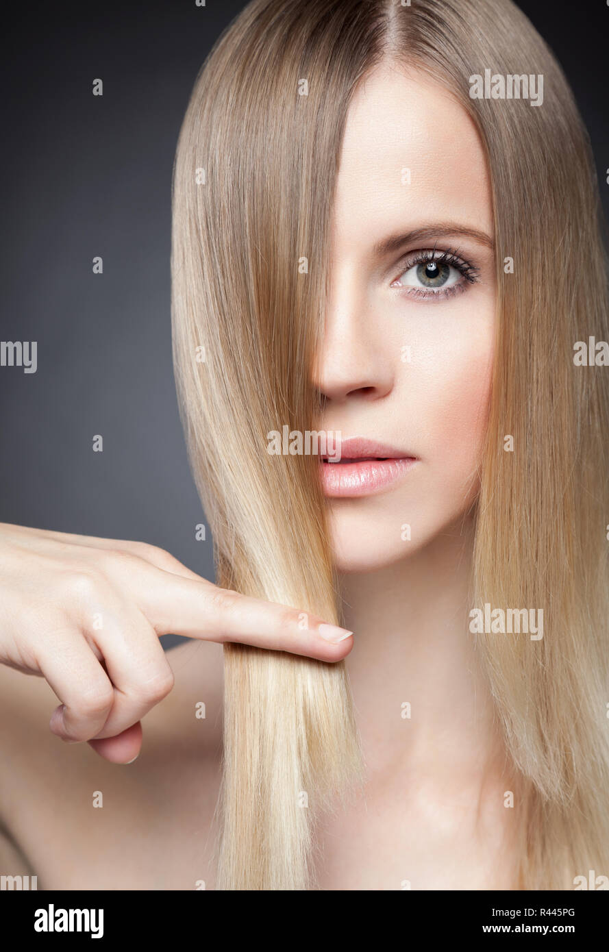 Beautiful lady with straight hair Stock Photo - Alamy
