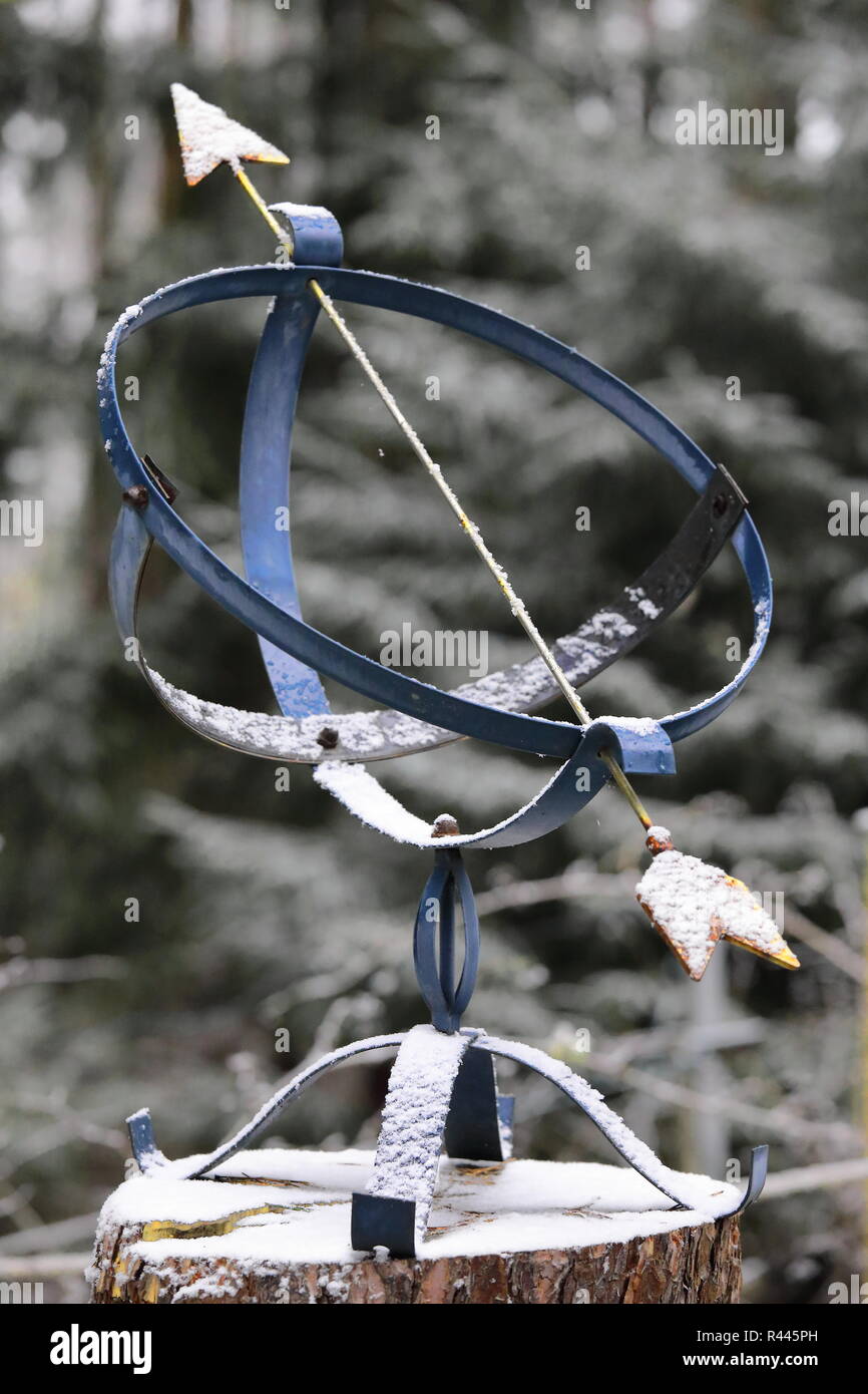 Seasonal clock change. A sundial switched into a wintertime. The nature ...