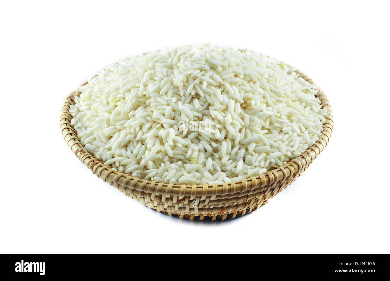 raw rice isolated / white rice in basket isolated on white background ...