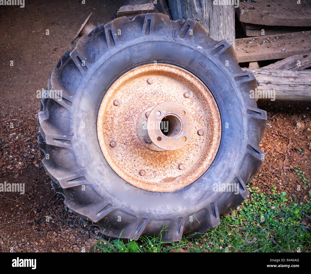 Old tire tractor in wheels Stock Photo - Alamy